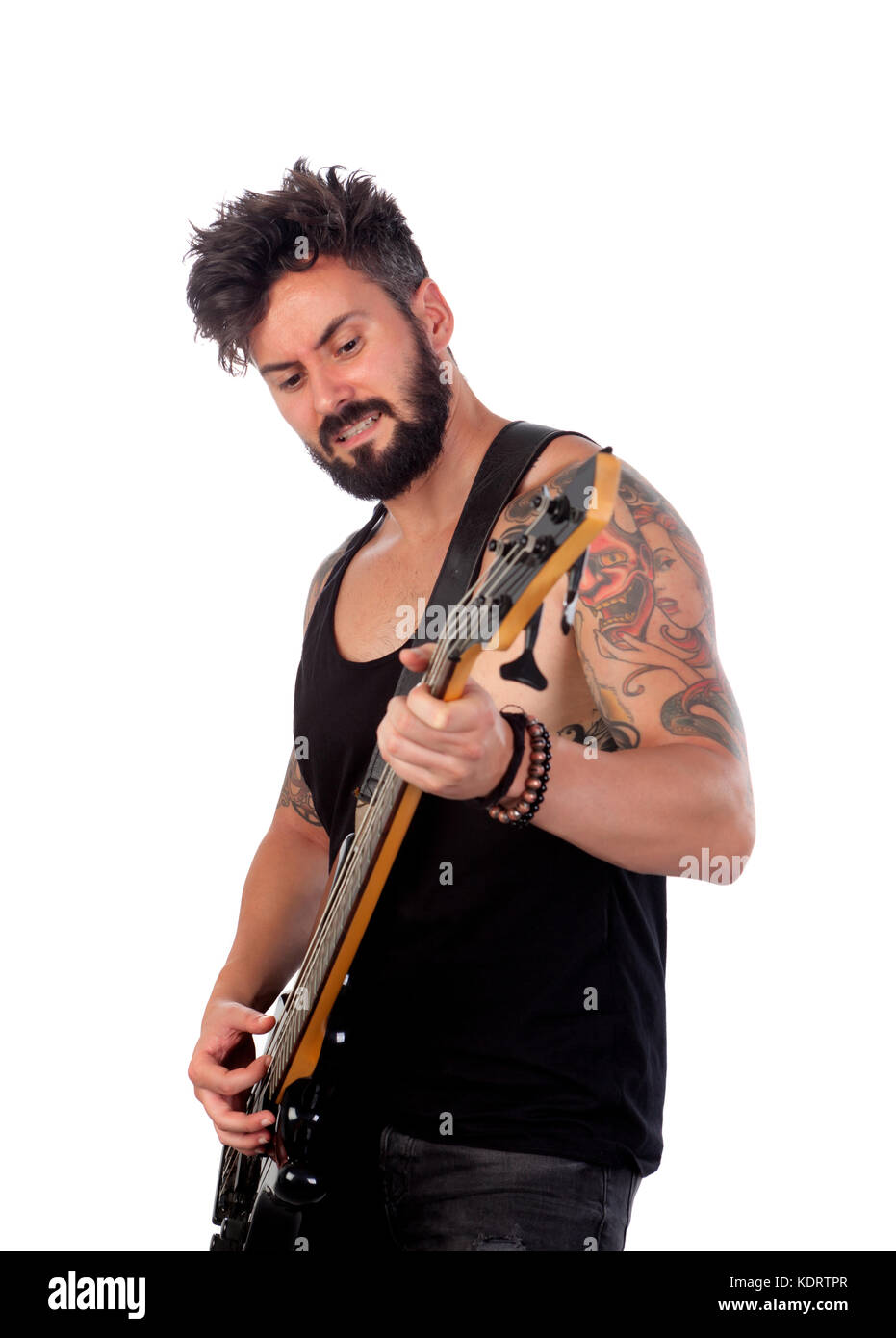 Attractive guy in black playing electric bass isolated on a white ...