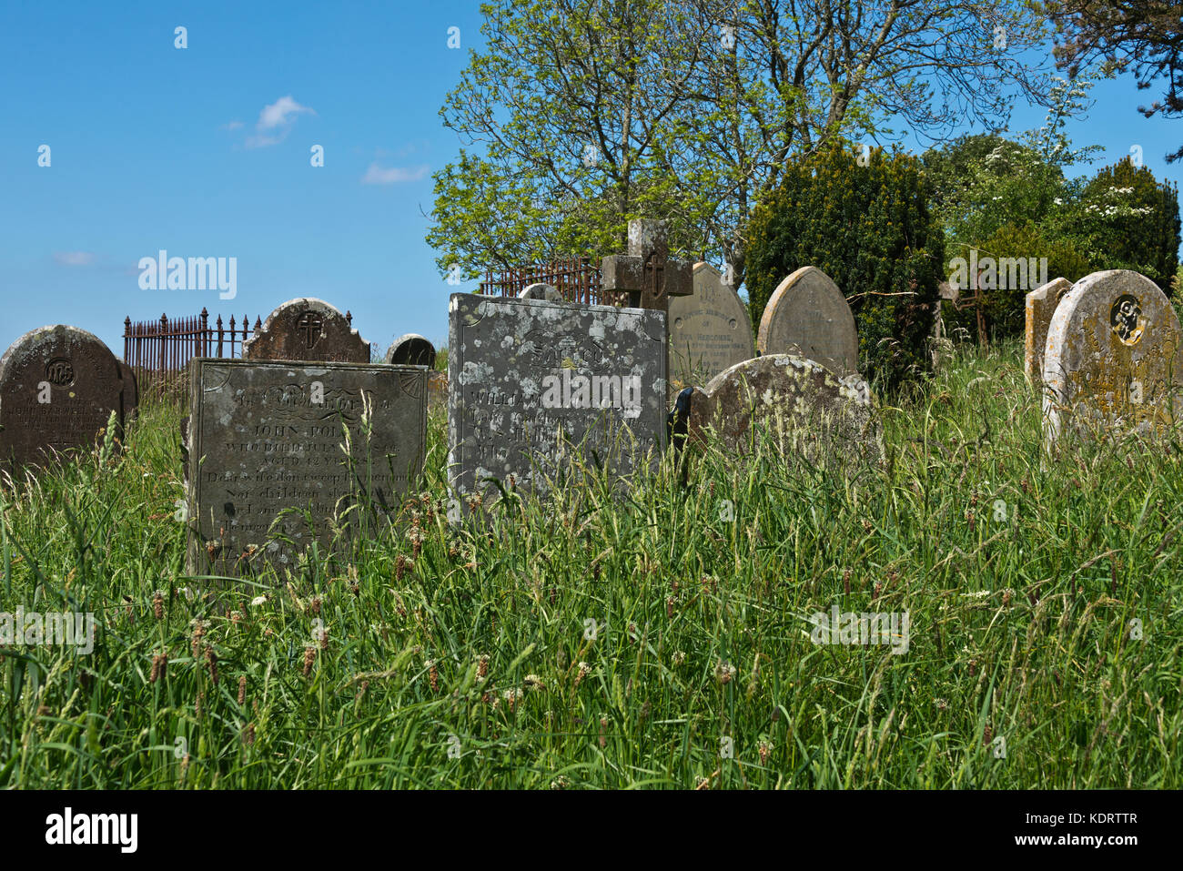 Gravestones in the churchyard of Church of St John the Baptist at ...