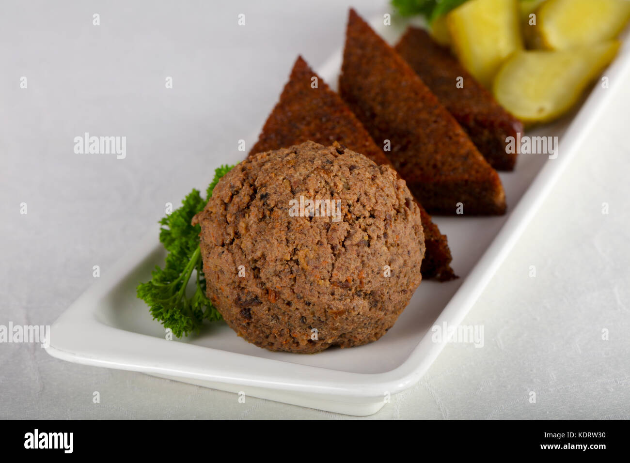 Liver spread with bread and pickled cucumbers Stock Photo - Alamy