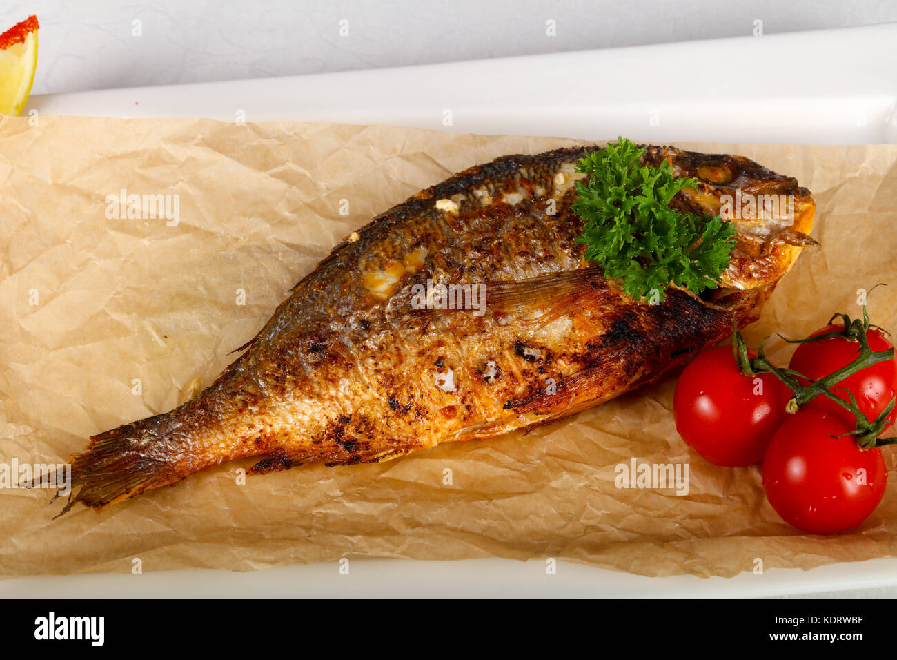 Roasted dorada fish Stock Photo - Alamy