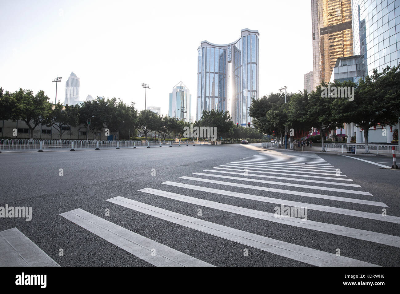 Road with zebra crossing in the city Stock Photo - Alamy
