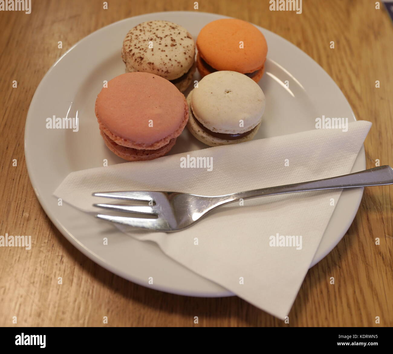 Macaroons Assortment on White ceramic plate Stock Photo - Alamy