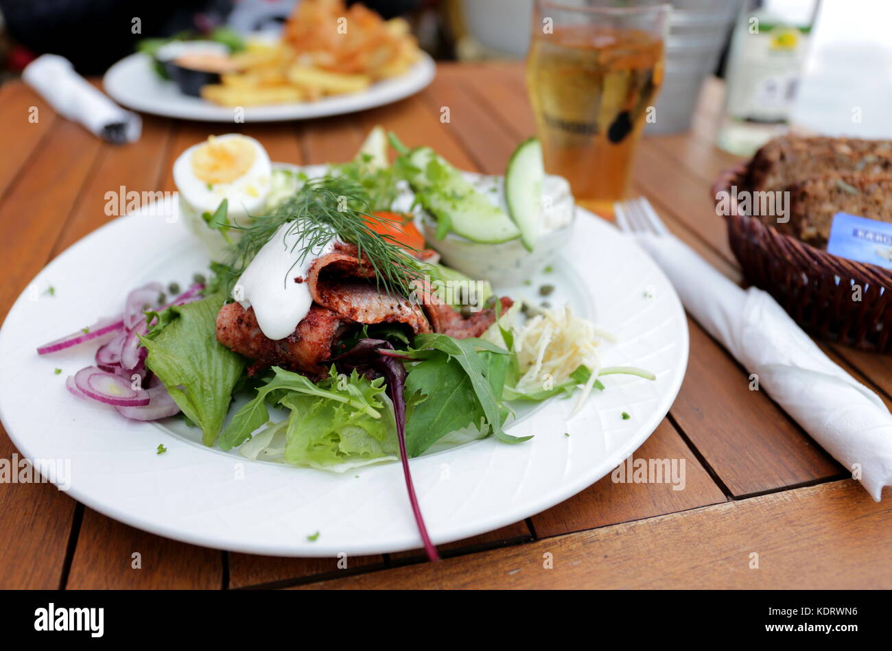 Authentic Danish Fish Assortment dish, fresh salad and egg with bread ...