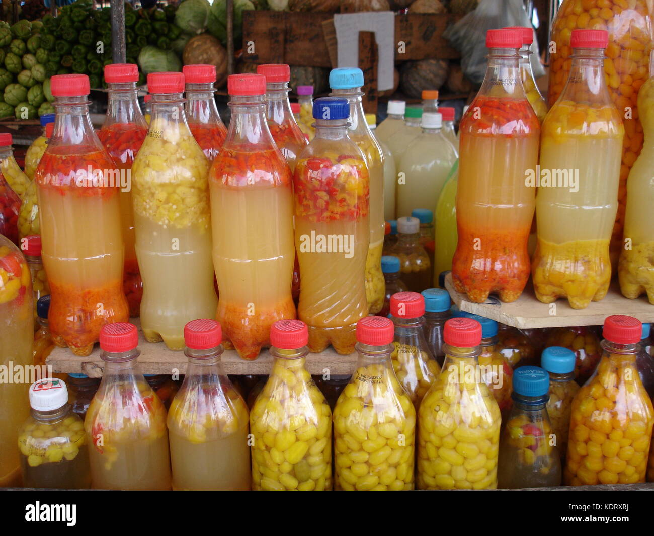 Ver-o-peso market, bottles of spiced tucupi Stock Photo - Alamy