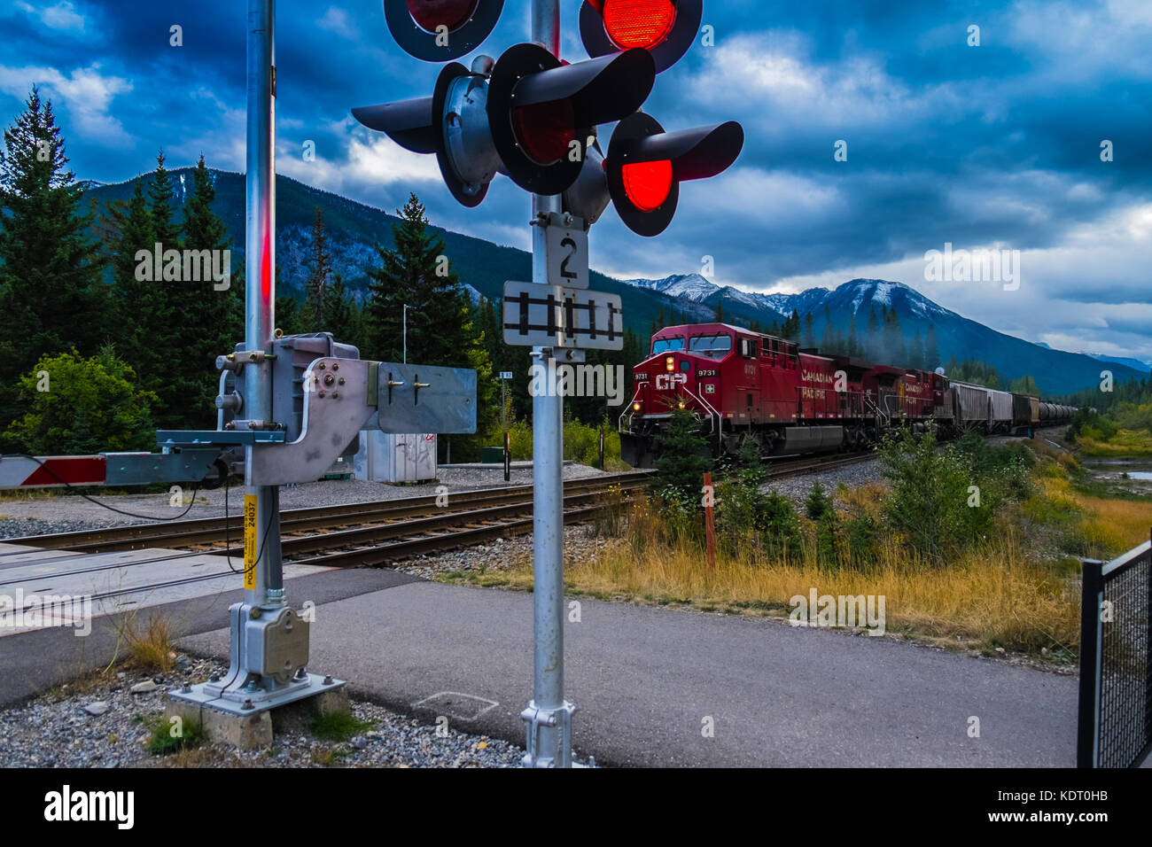 Canada train crossing red hi-res stock photography and images - Alamy
