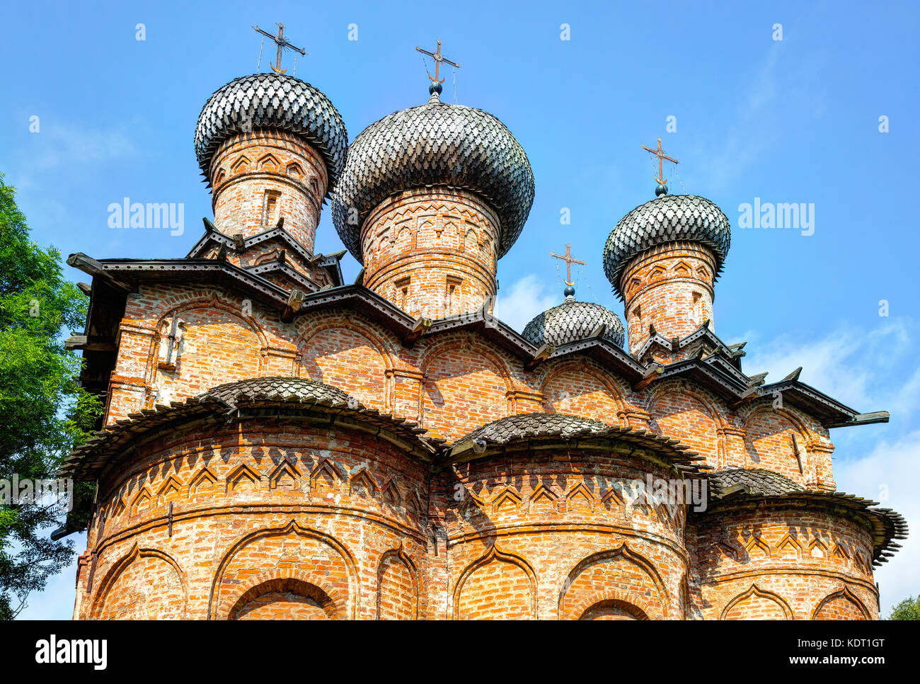 Ancient russian orthodox church with wooden domes and crosses against ...