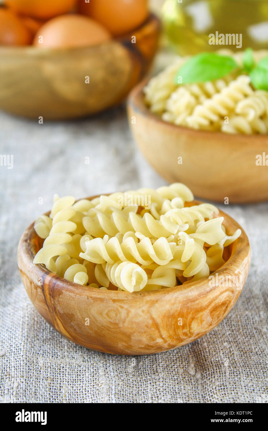 Helix- or corkscrew-shaped pasta. Rotini macaroni. Related to fusilli ...