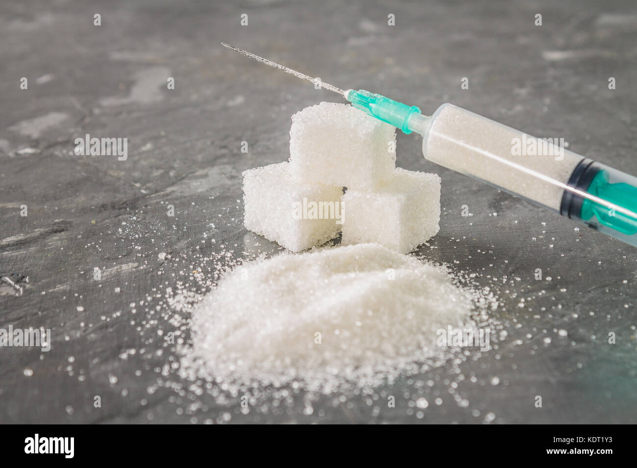 Sugar in a syringe. Conceptual depiction of dependence on the sweet ...