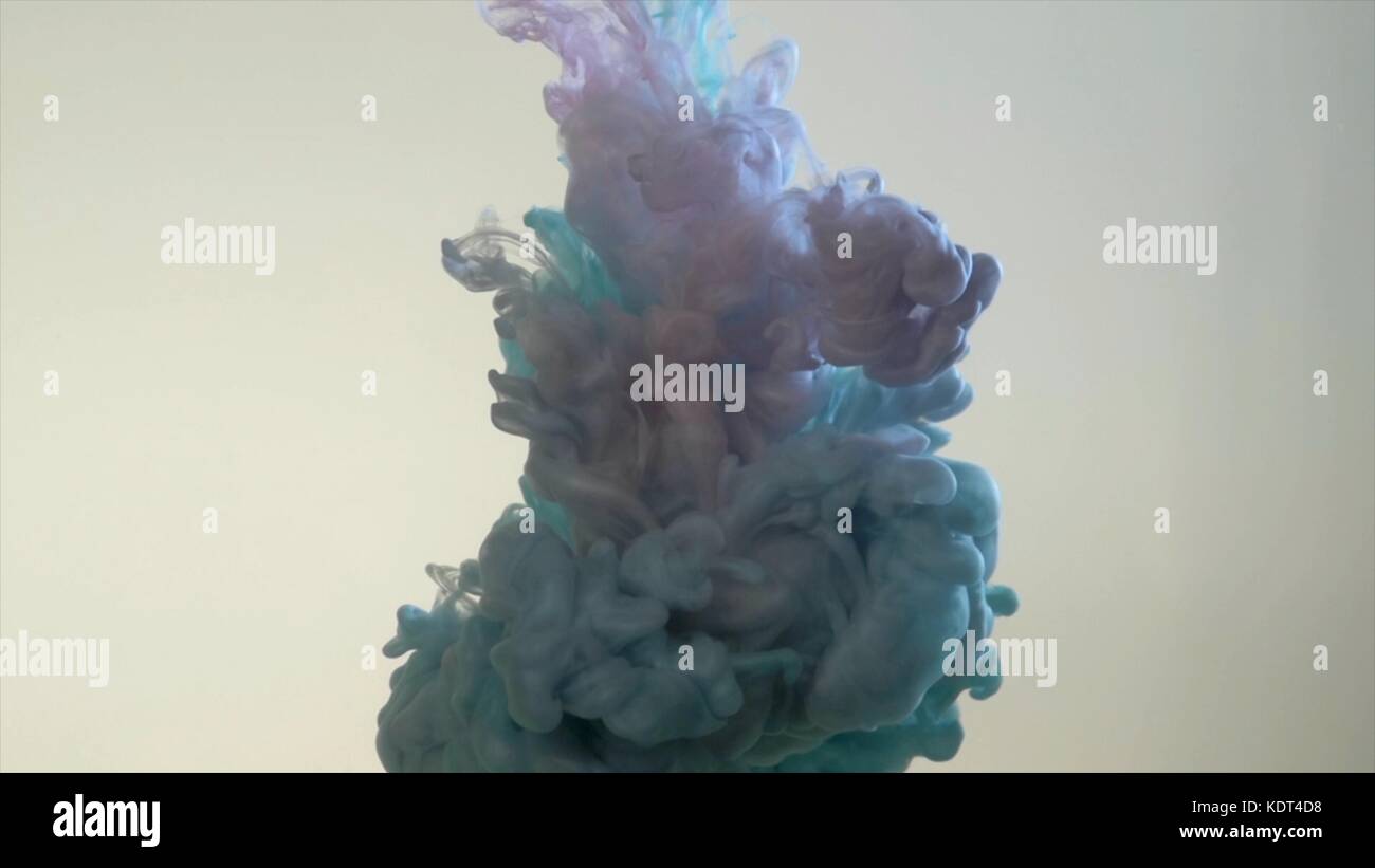 Ink swirling in water. Wave and smoke of different colors on white ...