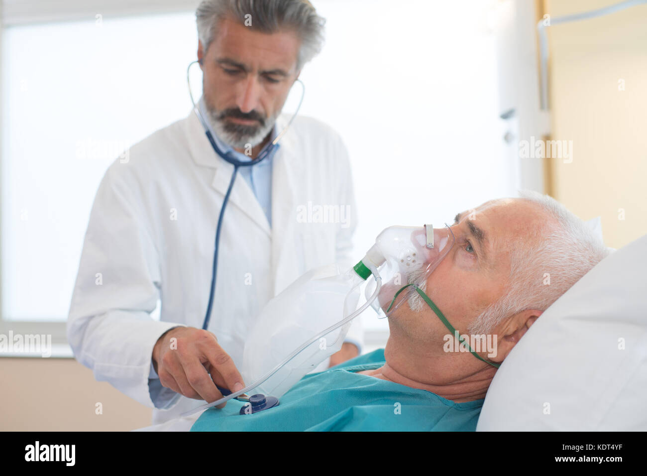 doctor monitoring the patients progress Stock Photo - Alamy
