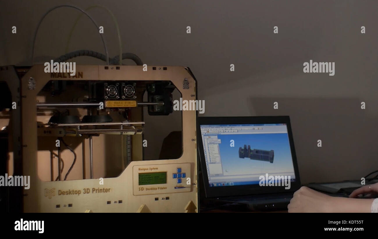 Working With 3D Printer In Design Studio. Designer Working With 3D ...