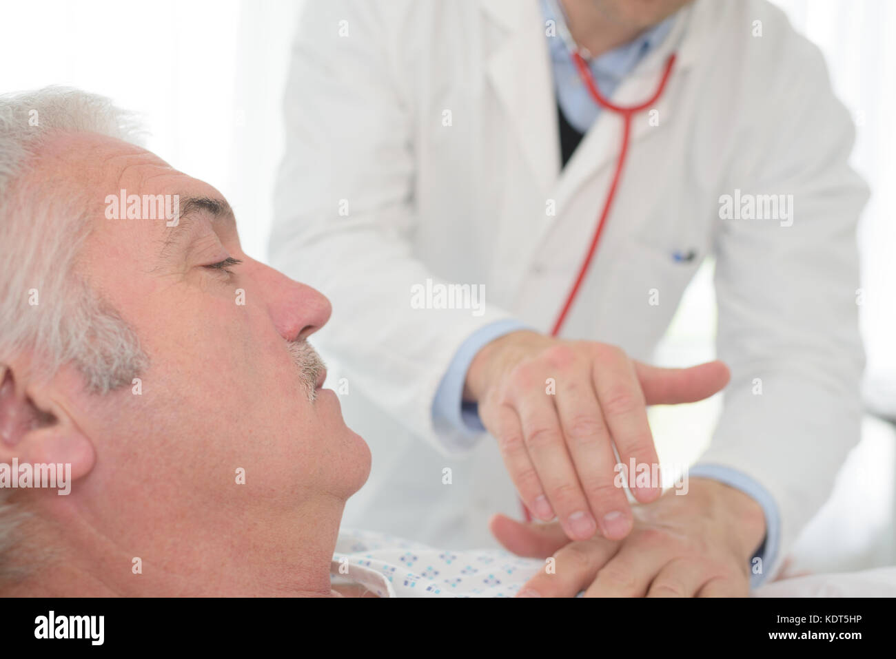 doctor with senior patient Stock Photo - Alamy