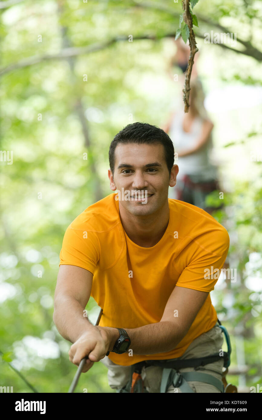 climber man in the adventure park Stock Photo - Alamy