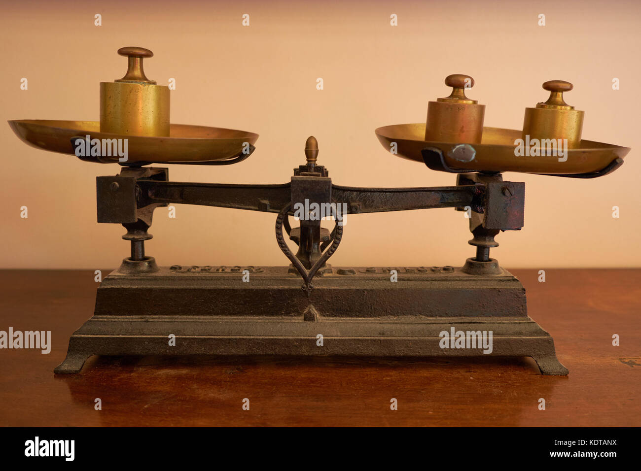 Antique balance in equilibrium Stock Photo - Alamy
