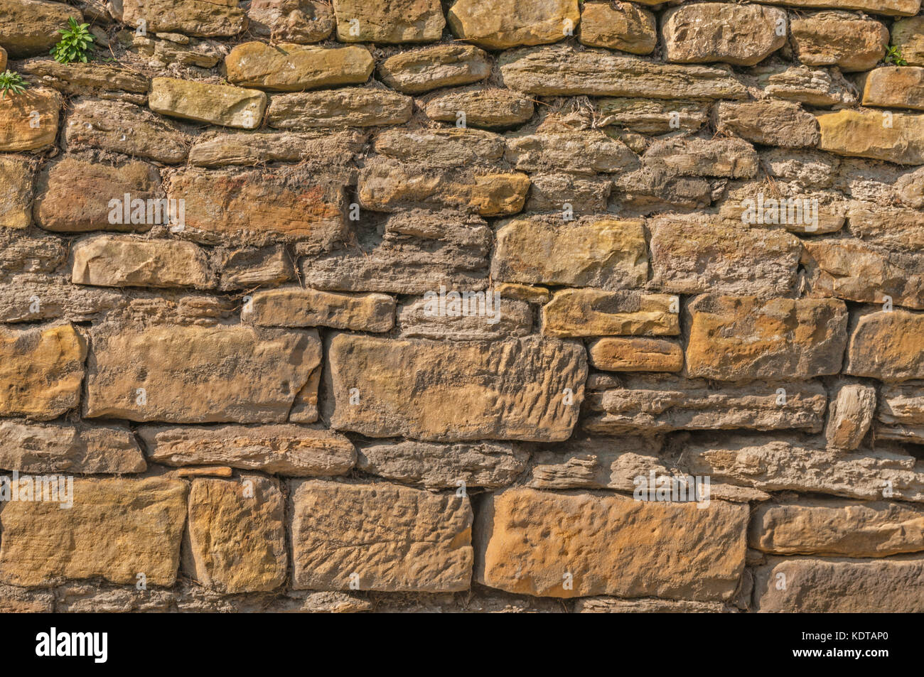 Weathered Old Stone Wall Background Stock Photo - Alamy