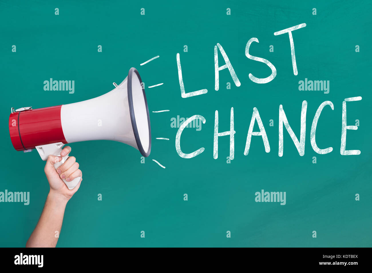 Close-Up Of Person Hand Holding Megaphone with Last Chance Announcement ...