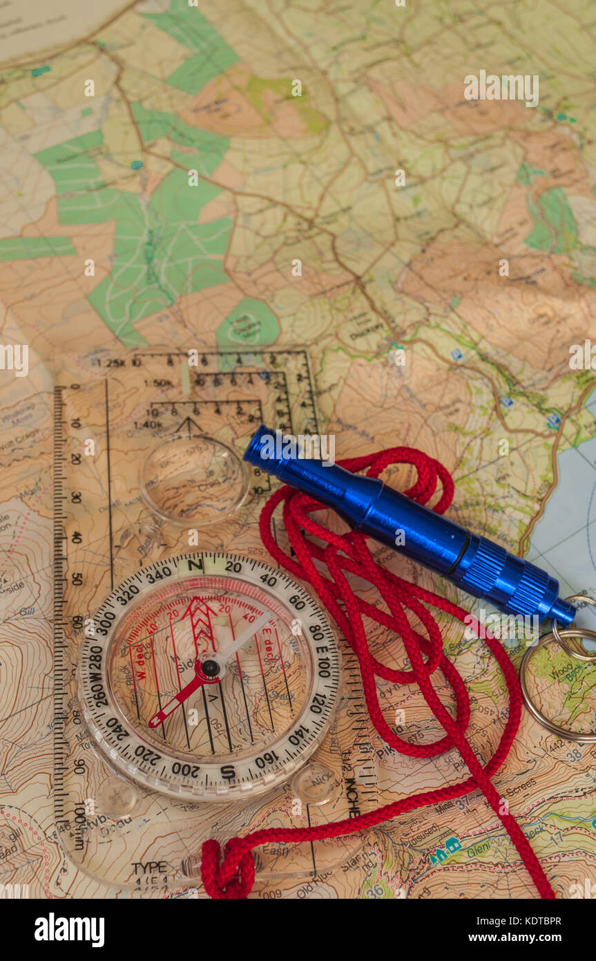 Compass showing direction on Topographic Map with Rescue Whistle ...