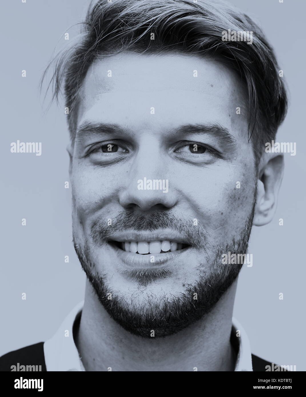 Close up portrait of an elegant handsome man looking at camera Stock ...