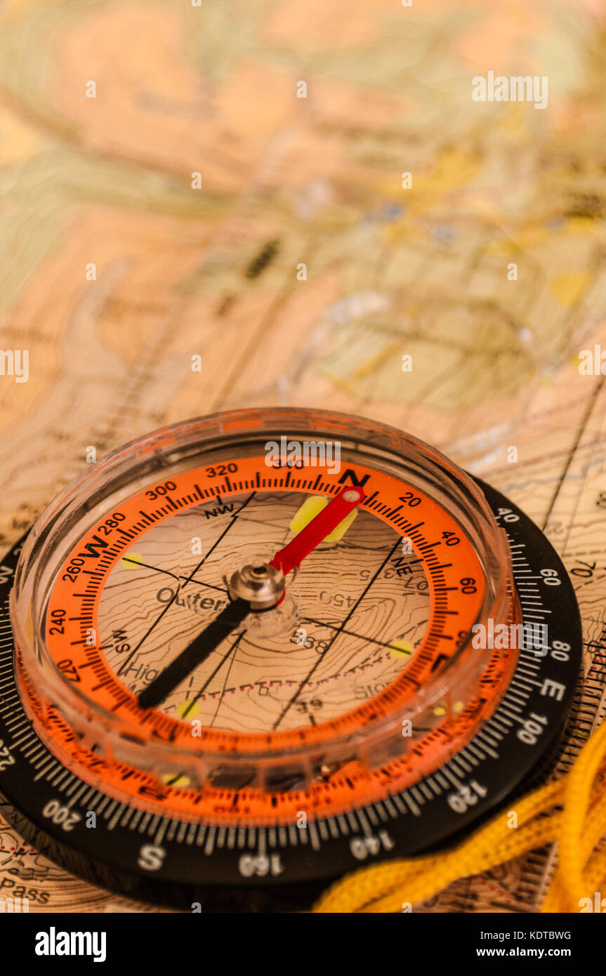 Compass showing direction on Topographic Map, Shallow Depth of Field ...