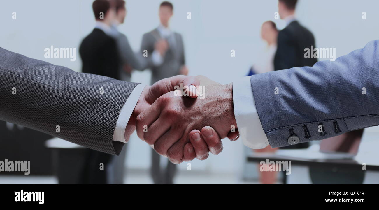 Closeup of a business handshake Stock Photo - Alamy