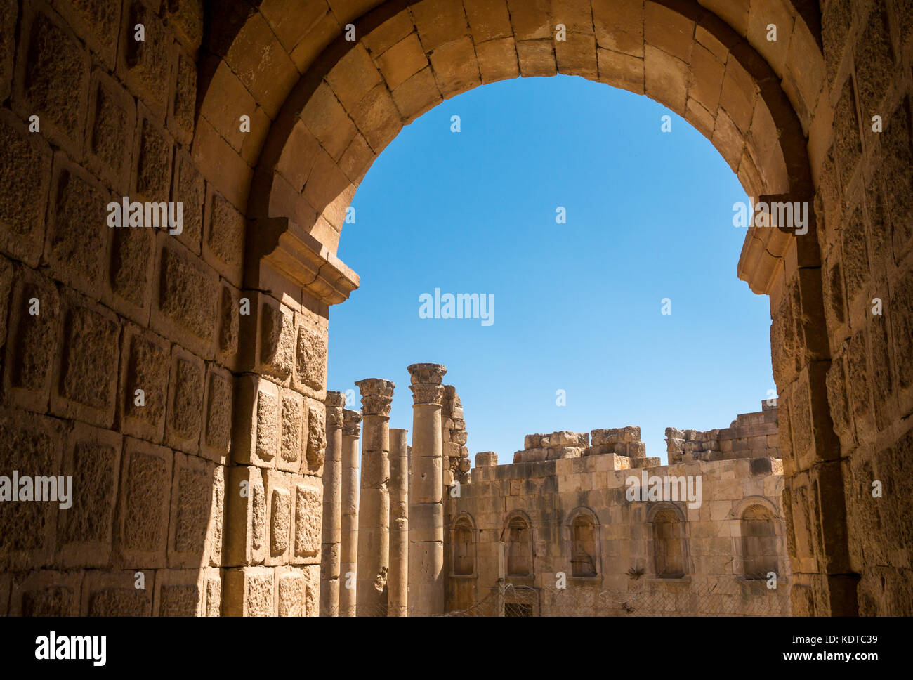 Looking through arch at South Theatre amphitheatre, Roman city of ...