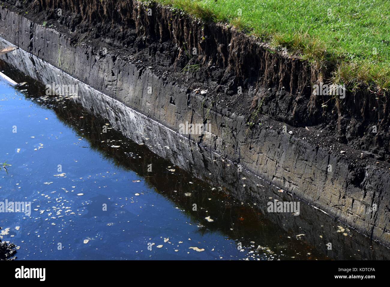 peat stacks in the autumn sun, harvesting the peat in bavaria, rural ...