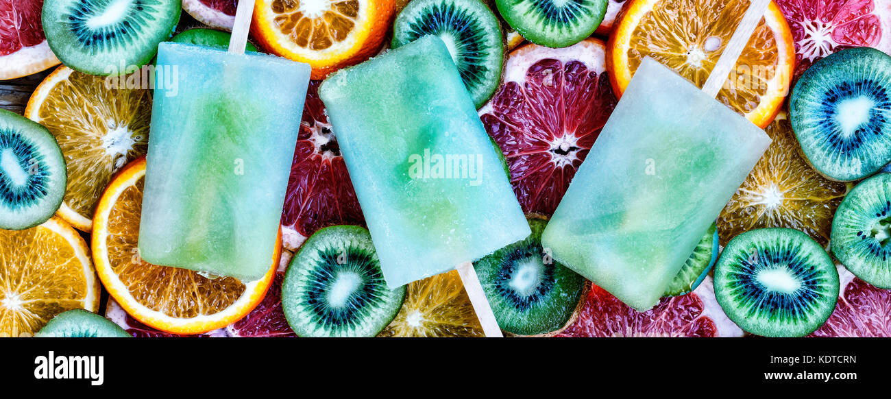 Fruit ice, sliced fruit, kiwi, orange, grapefruit. Concept: summer ...