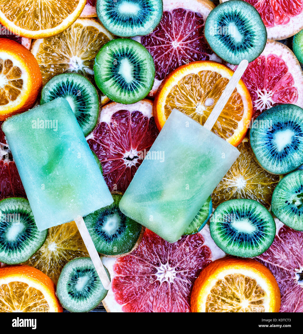Fruit ice, sliced fruit, kiwi, orange, grapefruit. Concept: summer ...