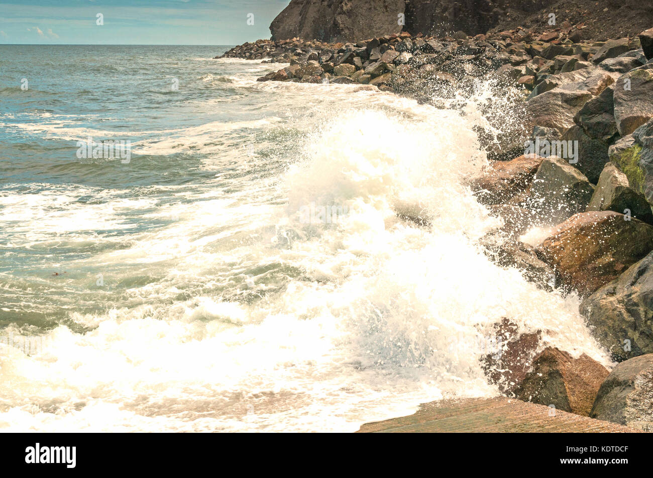 Breaking Ocean Waves on Rocky Shoreline Stock Photo - Alamy