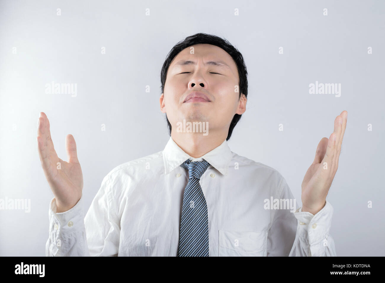 business man praying Stock Photo - Alamy
