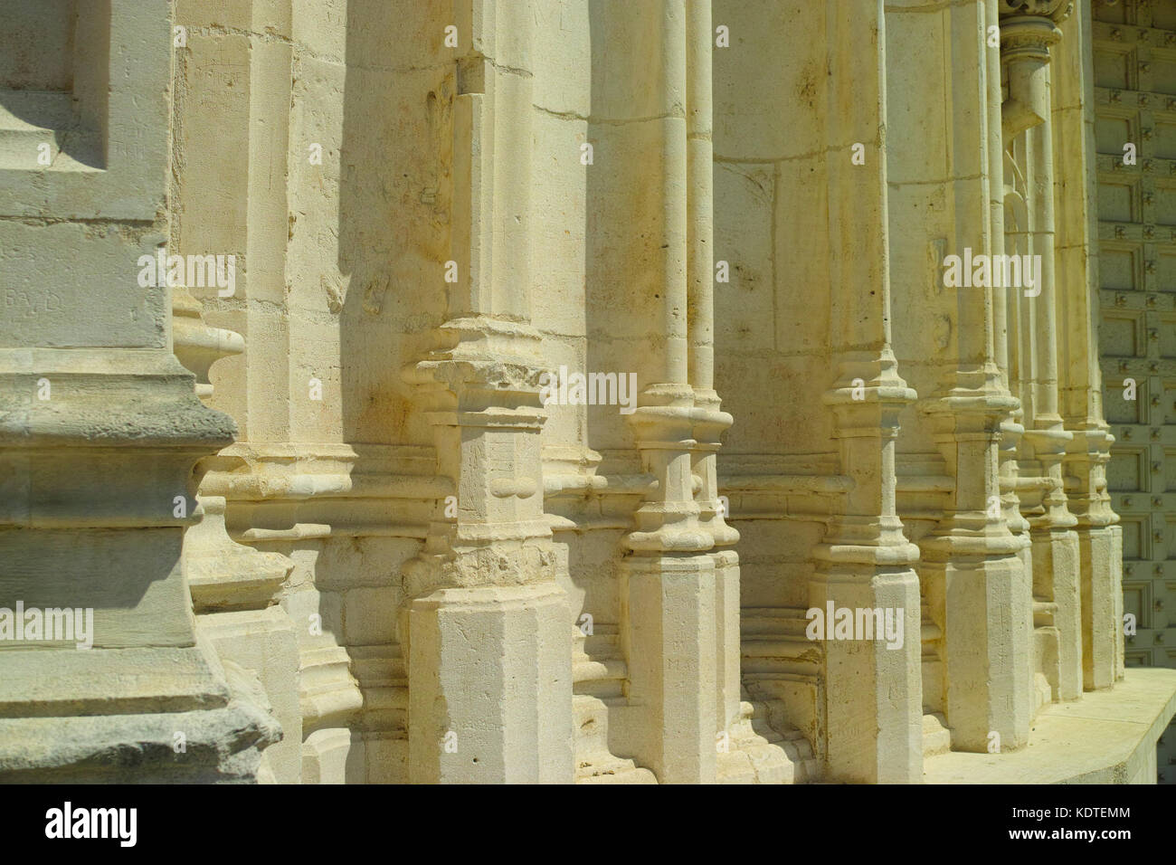 Details of old french abbey, white stone columns, sunset Stock Photo ...