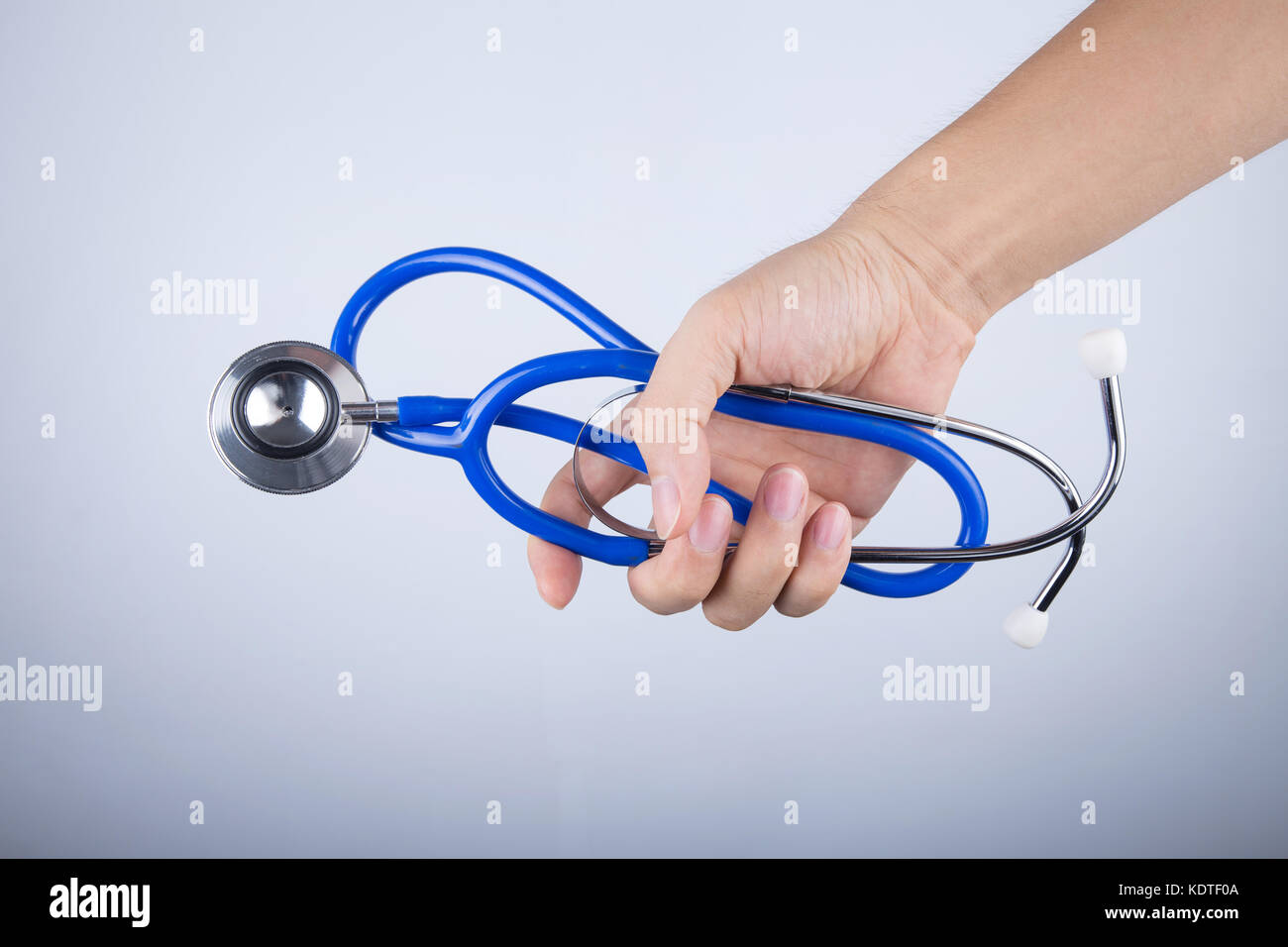 hand holding stethoscope Stock Photo - Alamy