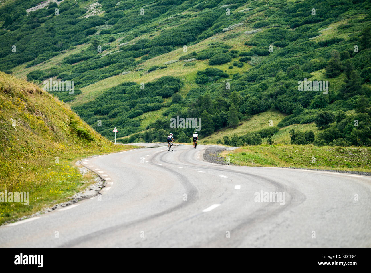 cyclist on the road near of the La Grave, Alps, France, Europe Stock ...