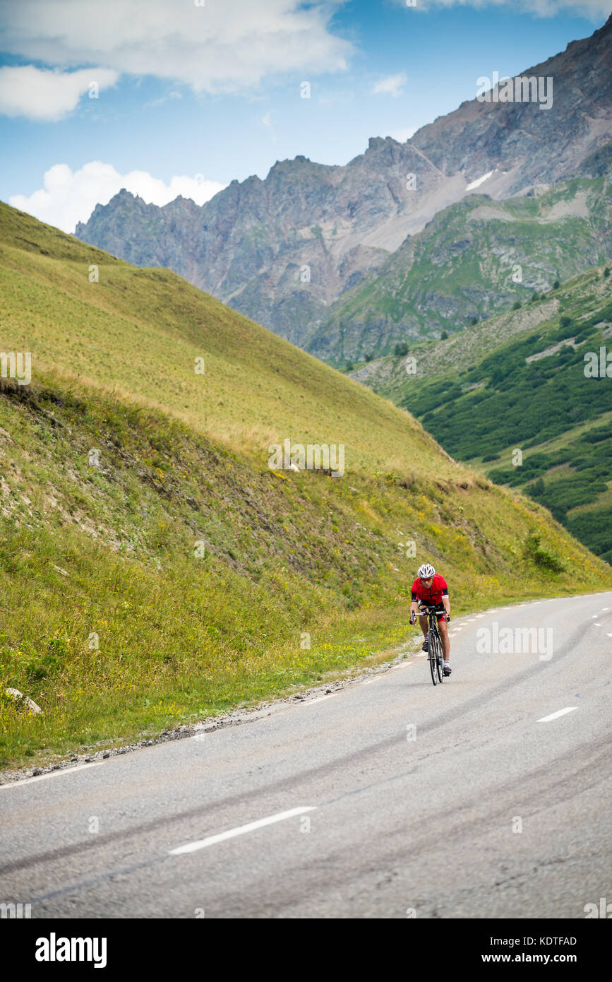 cyclist on the road near of the La Grave, Alps, France, Europe Stock ...