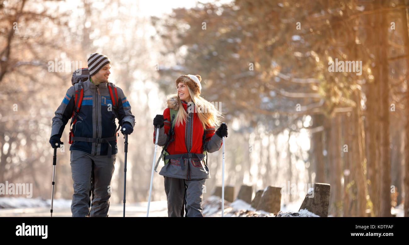 Young boy and girl skiing in forest Stock Photo - Alamy