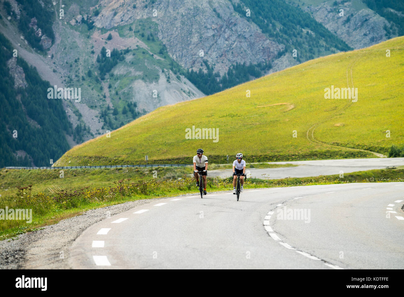 cyclist on the road near of the La Grave, Alps, France, Europe Stock ...