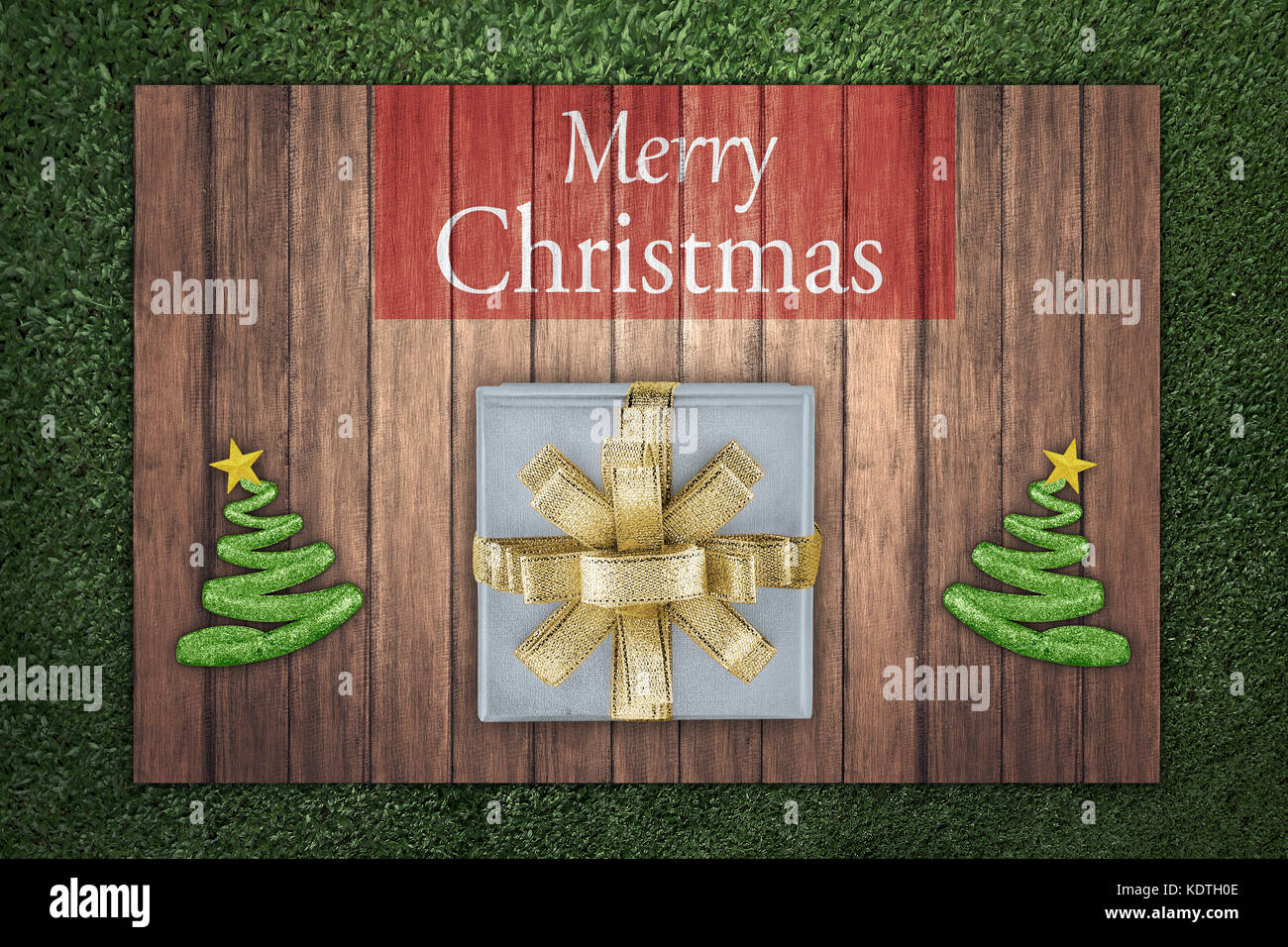 Christmas tree on green grass hi-res stock photography and images - Alamy