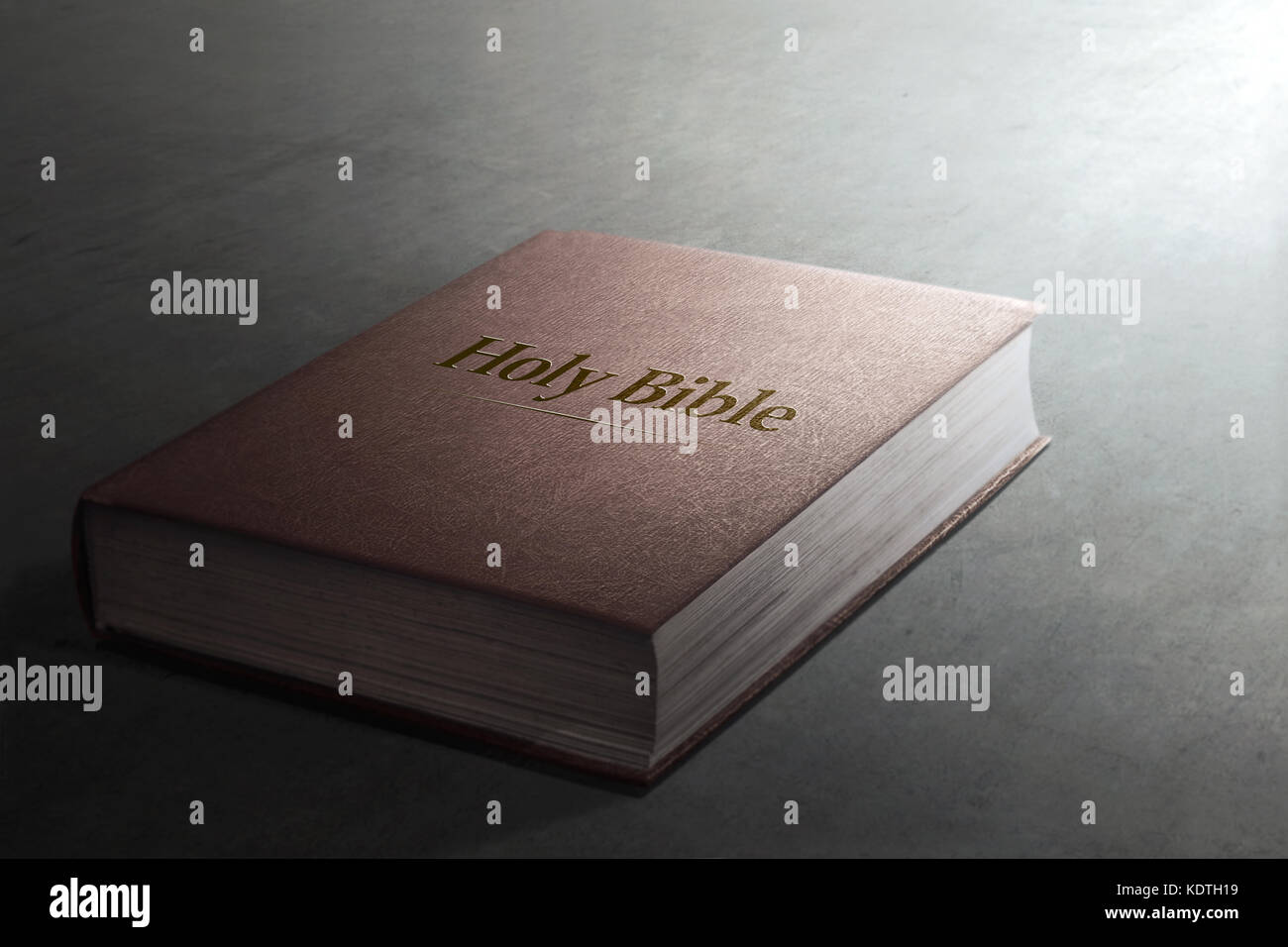 Holy Bible on gray background Stock Photo - Alamy