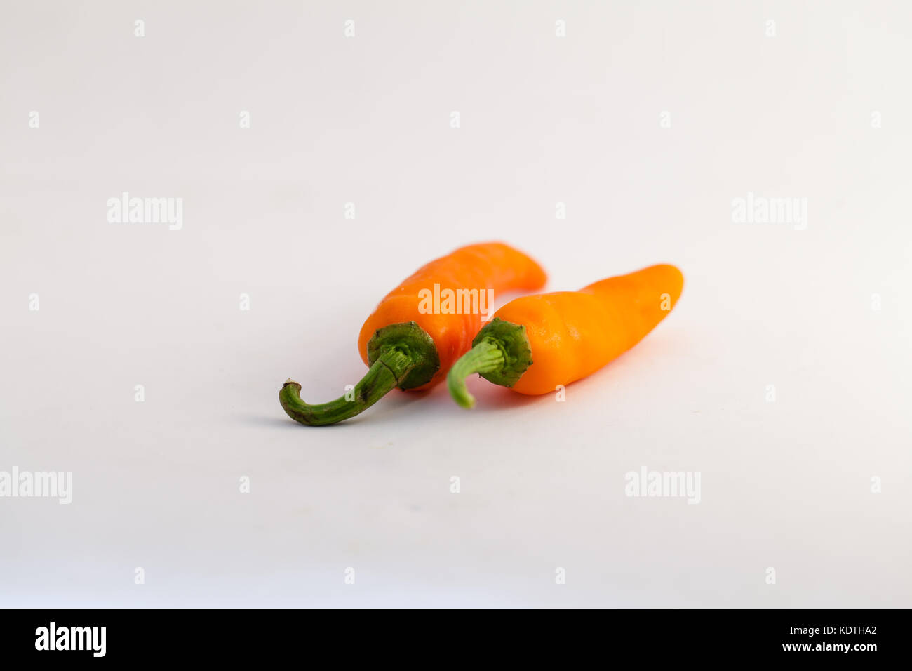 orange capsicum isolate on a white background Stock Photo - Alamy
