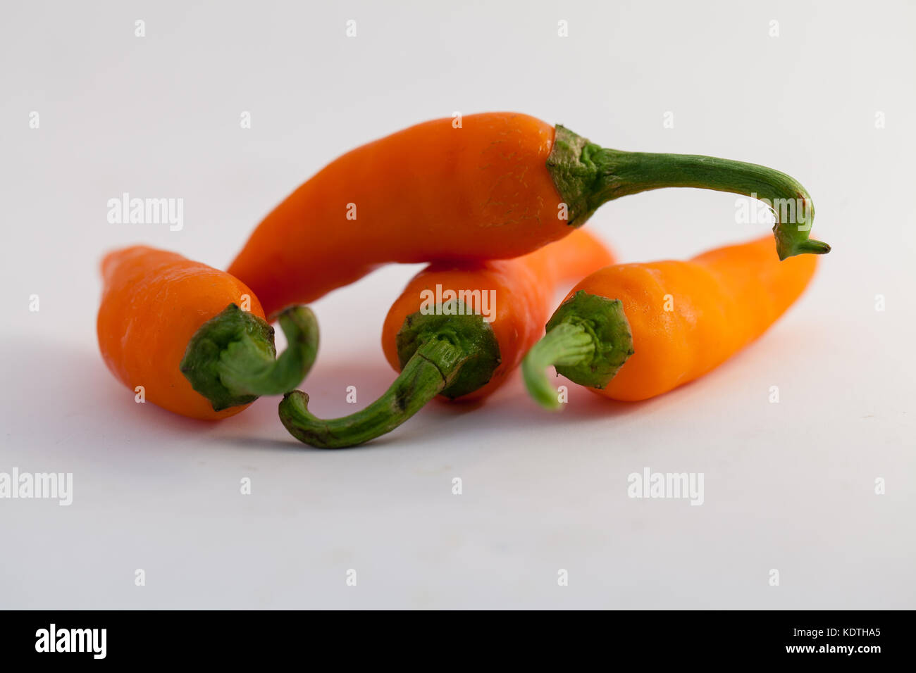 orange capsicum isolate on a white background Stock Photo - Alamy