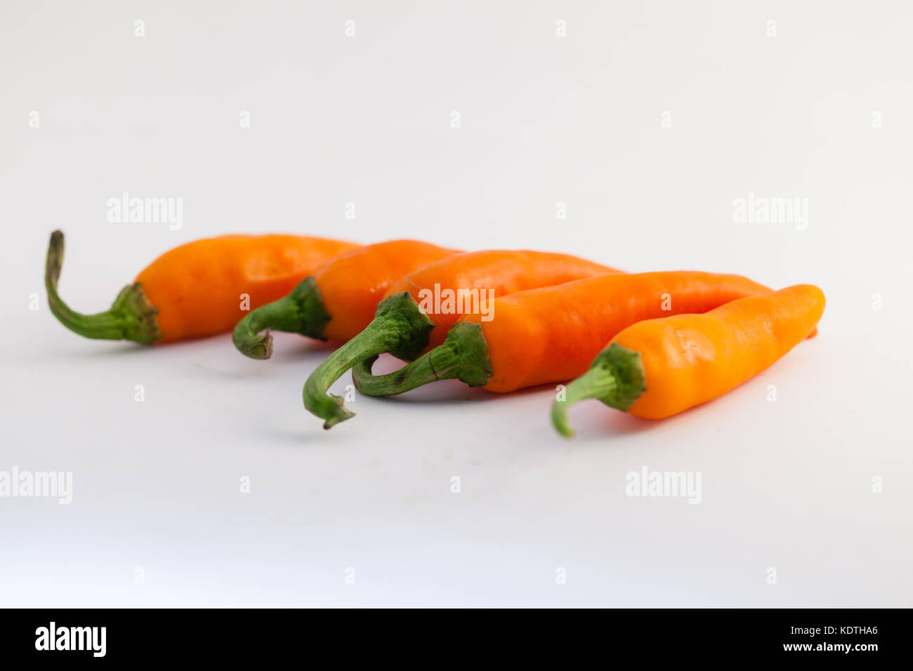 orange capsicum isolate on a white background Stock Photo - Alamy