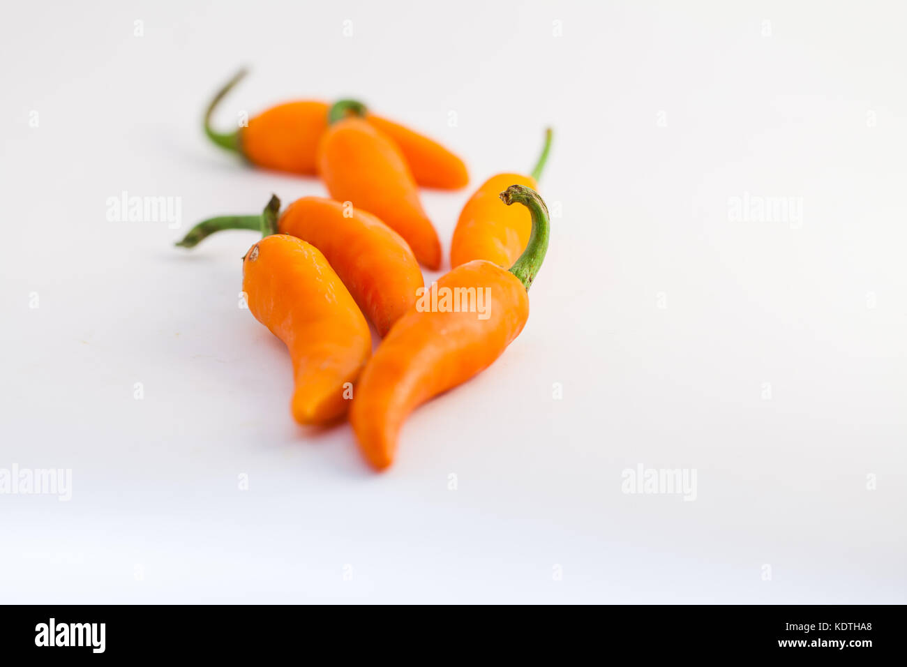 orange capsicum isolate on a white background Stock Photo - Alamy