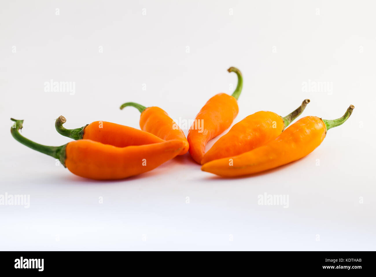 orange capsicum isolate on a white background Stock Photo - Alamy