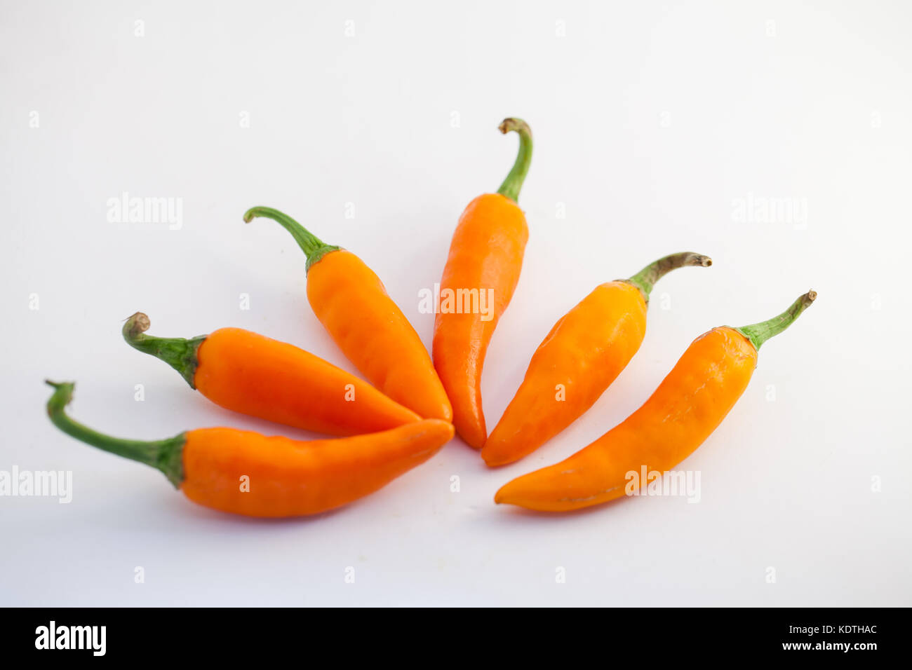orange capsicum isolate on a white background Stock Photo - Alamy