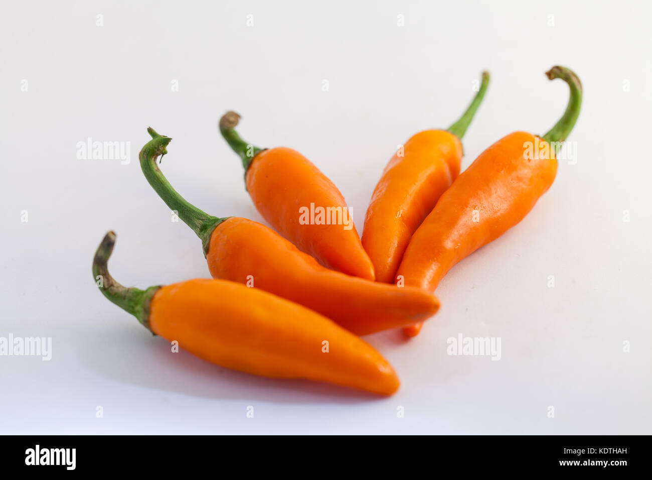 orange capsicum isolate on a white background Stock Photo - Alamy
