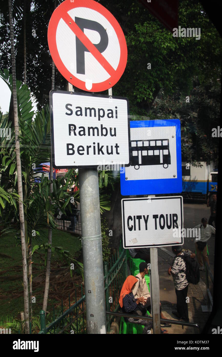 JAKARTA, INDONESIA - JULY 14, 2017: City tour bus stop sign at Istiqlal ...
