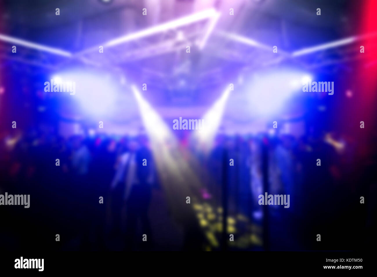 Lights in the club at midnight. Crowd of people at party. Motion ...