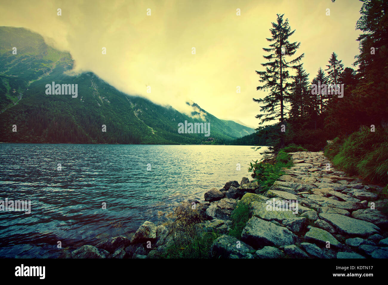 Lake in mountains. Fantasy and colorfull nature landscape. Retro ...