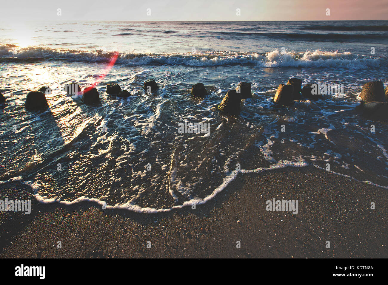 Sea ocean sunset and waves in vintage retro action Stock Photo - Alamy