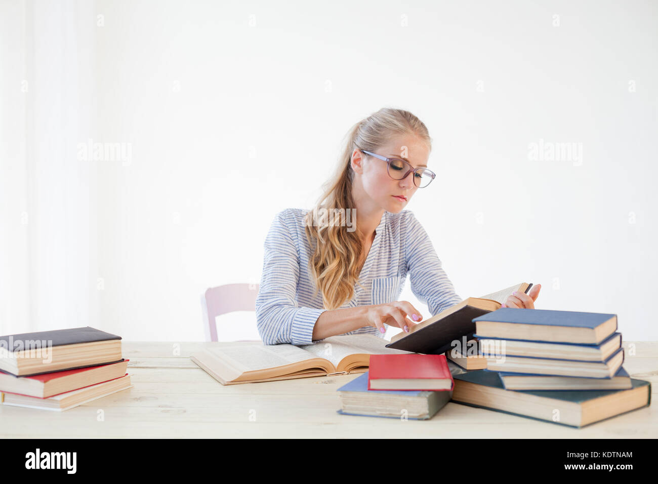business girl Secretary reads books is preparing for the exam Stock ...